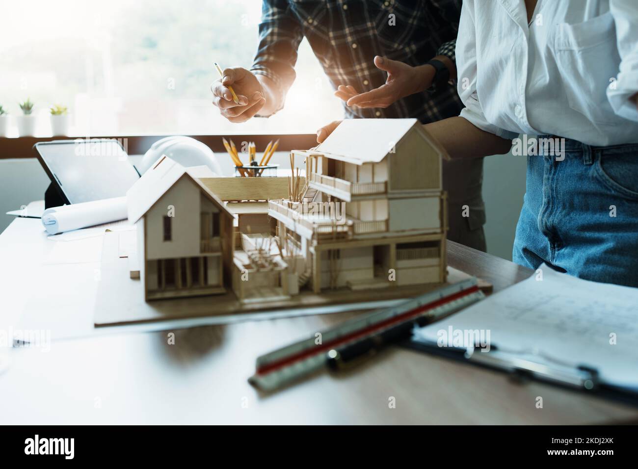 Engineers are consulting the team to design an architectural structure ...