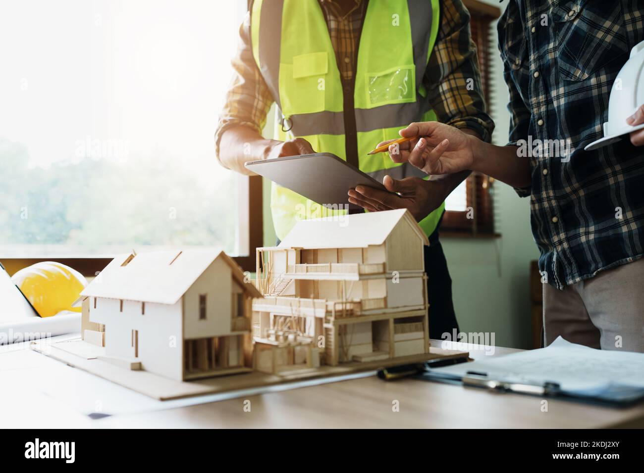 Engineers are consulting the team to design an architectural structure ...