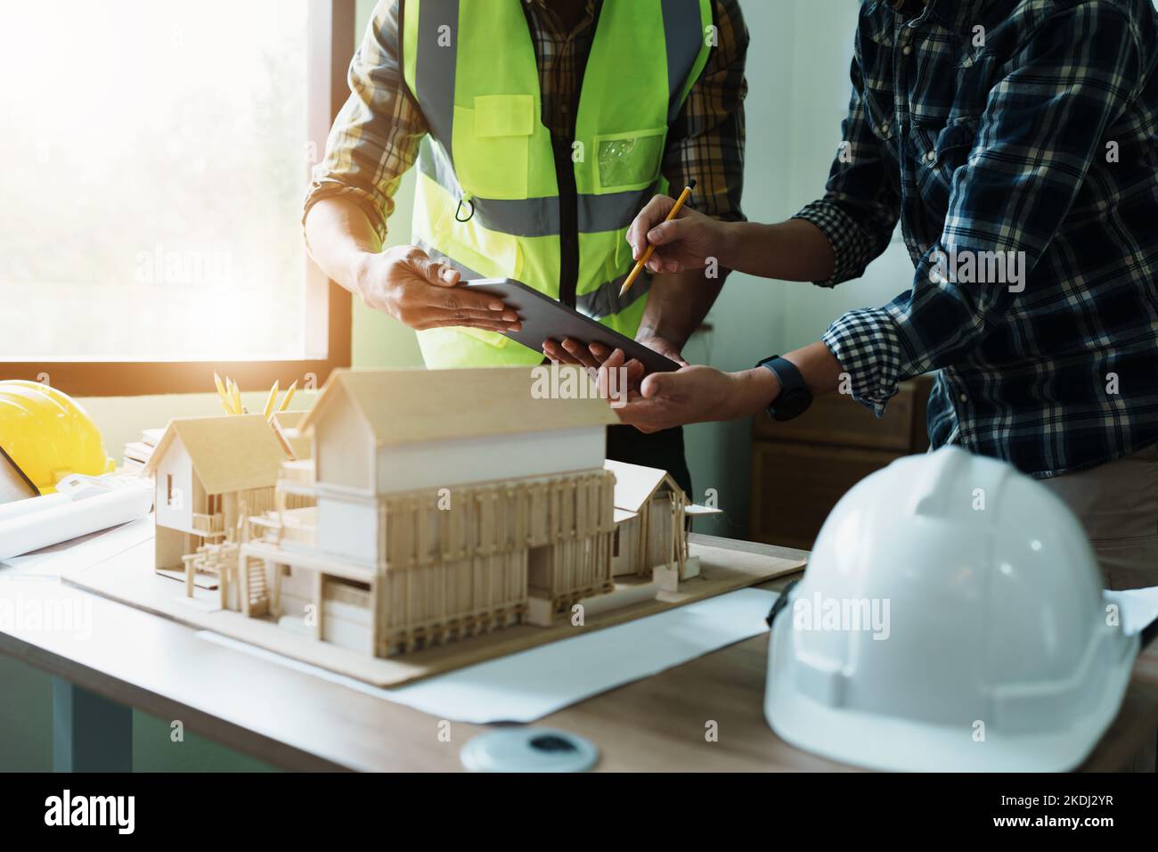 Engineers are consulting the team to design an architectural structure ...