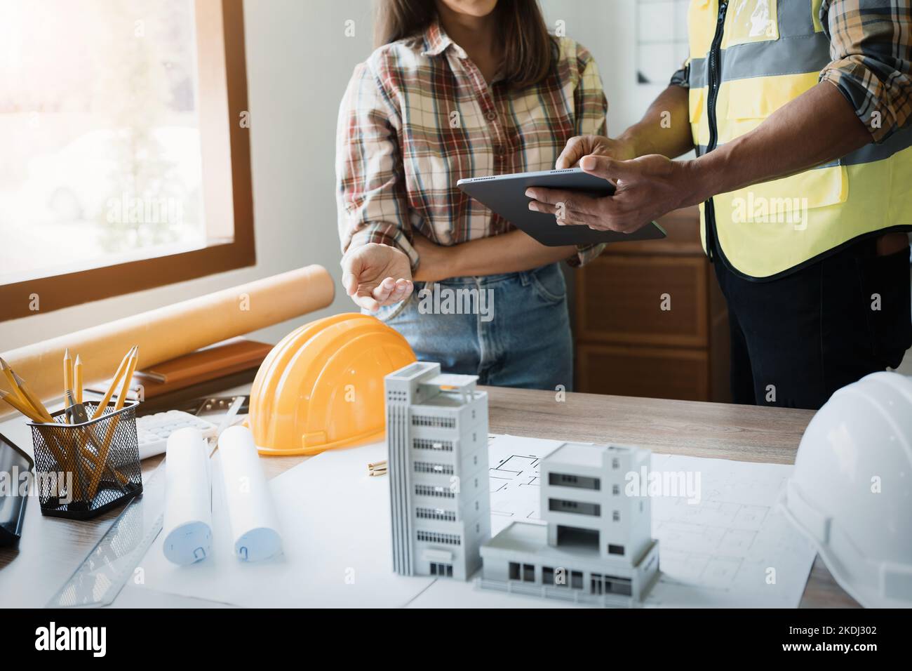 Engineers are consulting the team to design an architectural structure ...