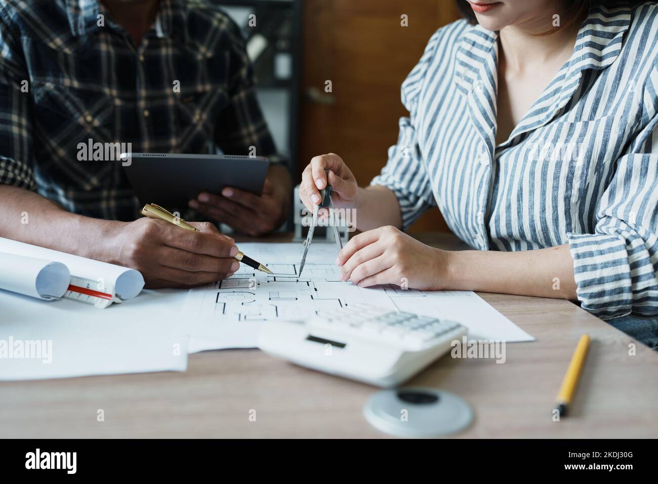 Engineers are consulting the team to design an architectural structure ...