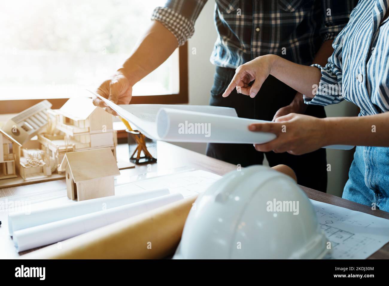 Engineers are consulting the team to design an architectural structure ...