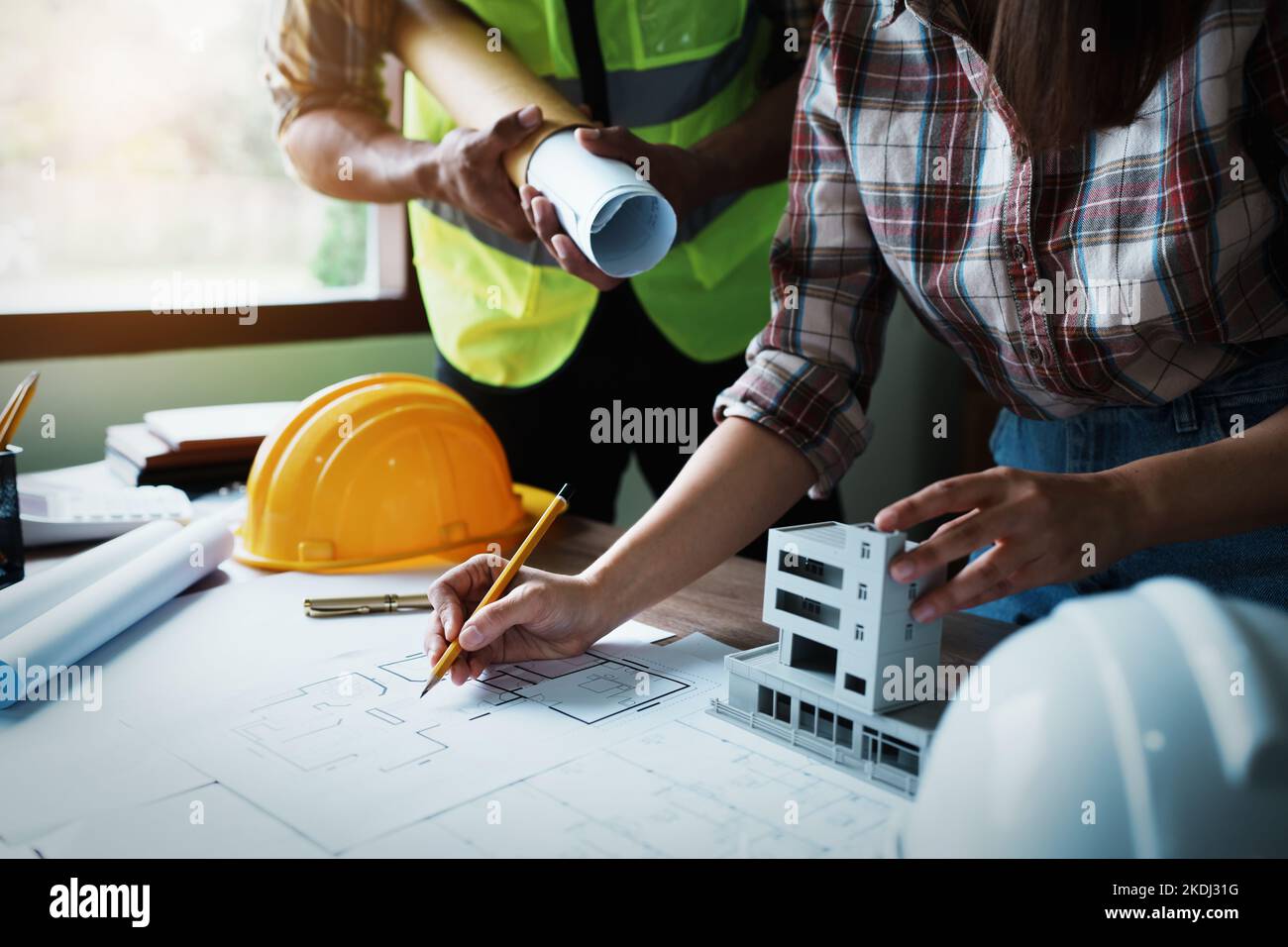 Engineers are consulting the team to design an architectural structure ...