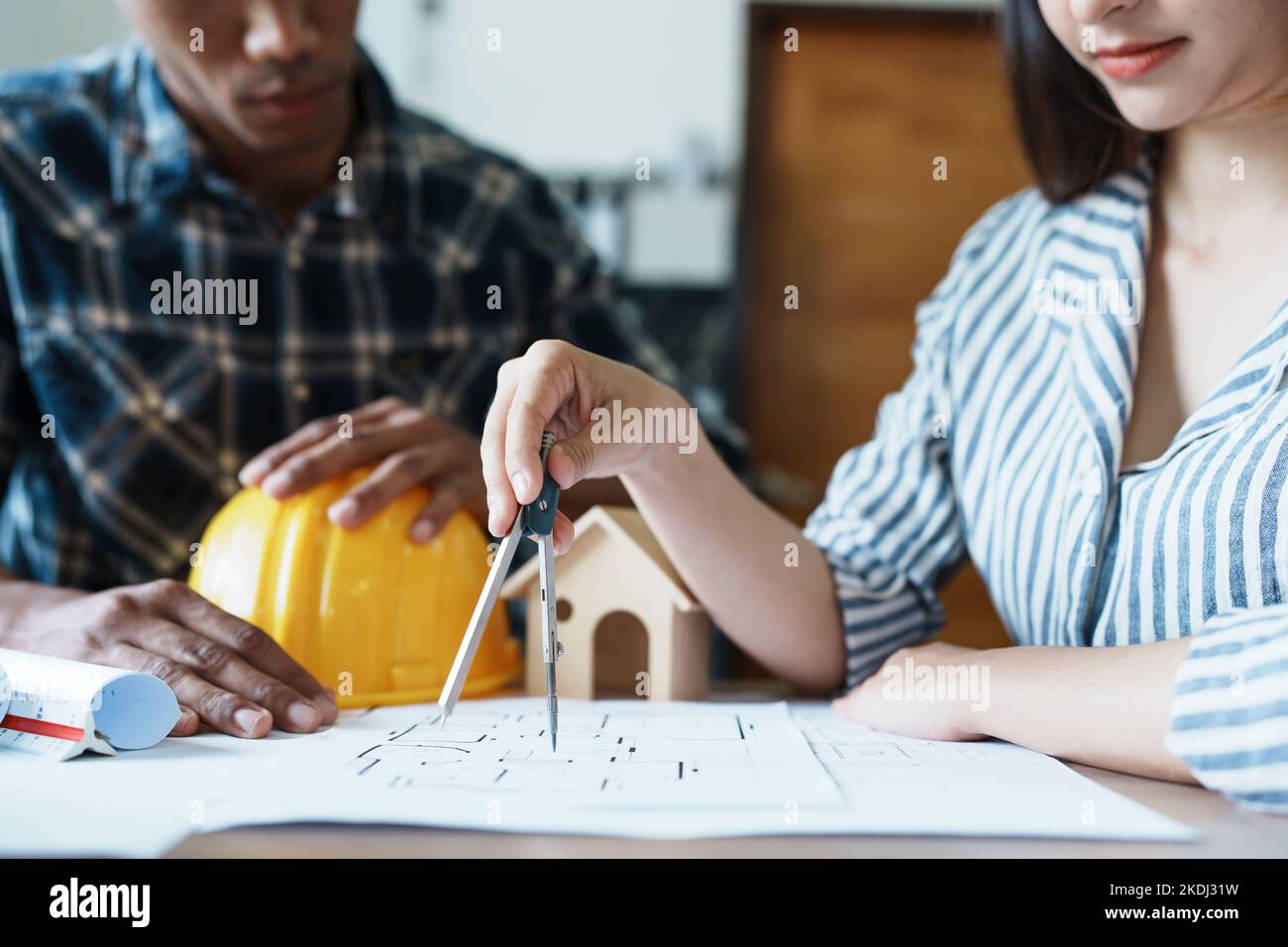 Engineers are consulting the team to design an architectural structure ...