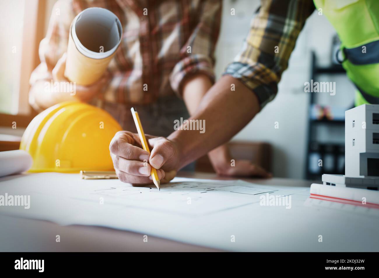 Engineers are consulting the team to design an architectural structure ...