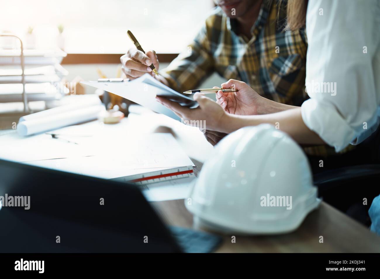 Engineers are consulting the team to design an architectural structure ...