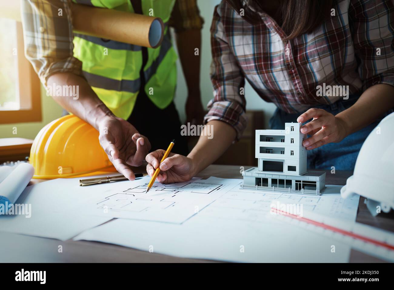 Engineers are consulting the team to design an architectural structure ...