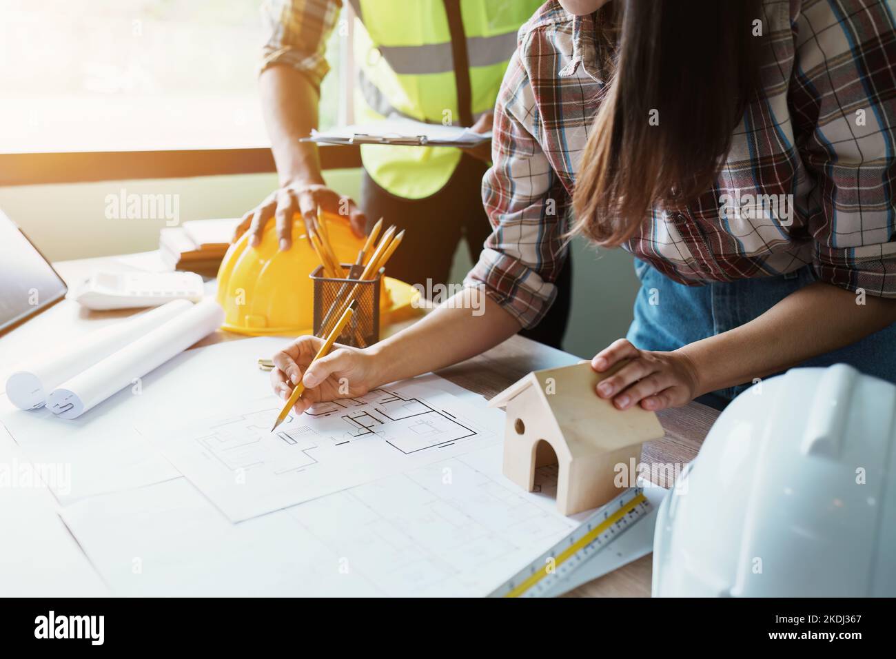 Engineers are consulting the team to design an architectural structure ...