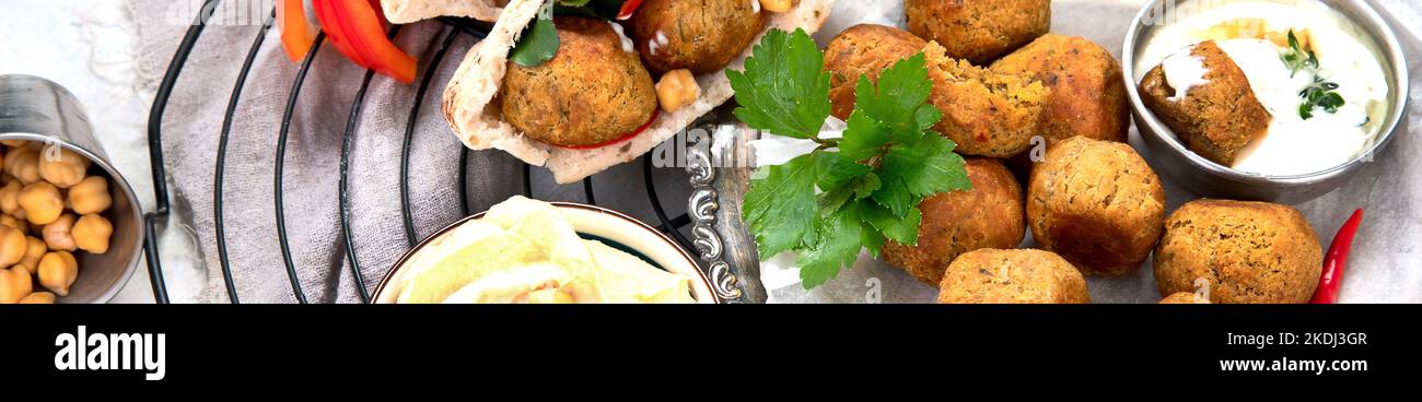 Middle eastern, arabic dishes with falafel, hummus, pita. Halal food ...