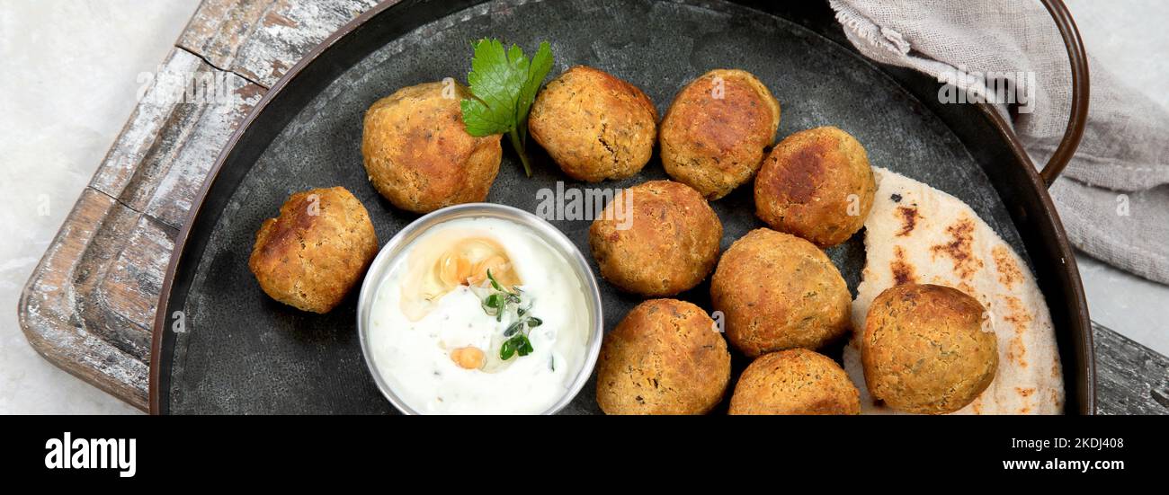 Chickpeas falafel with pita,sauce. Top view, panorama, banner Stock ...