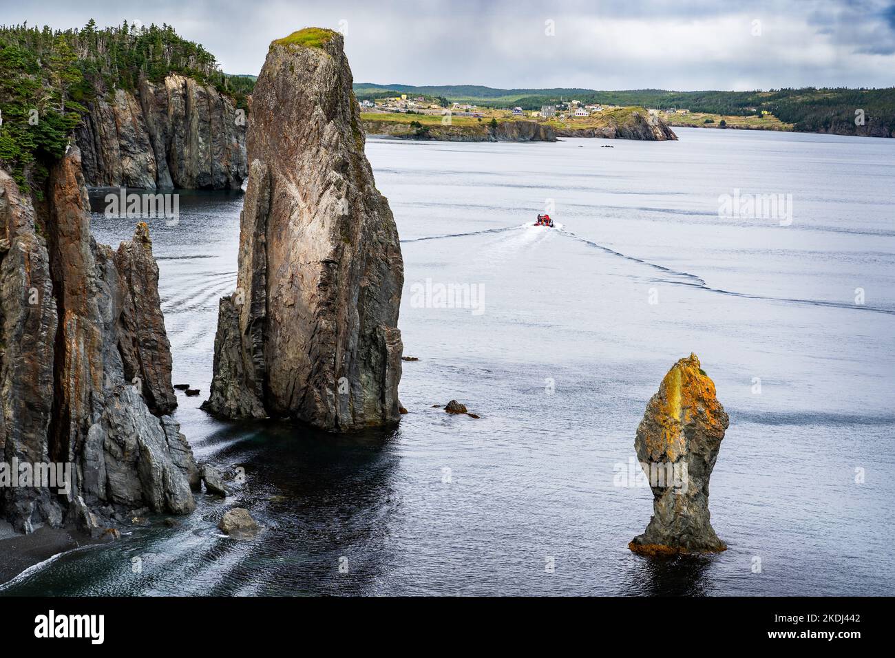 Standing near rocky shoreline person hi-res stock photography and ...