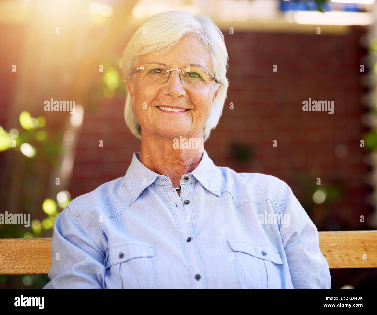 Retired and ready to relax. Portrait of a happy senior woman relaxing ...