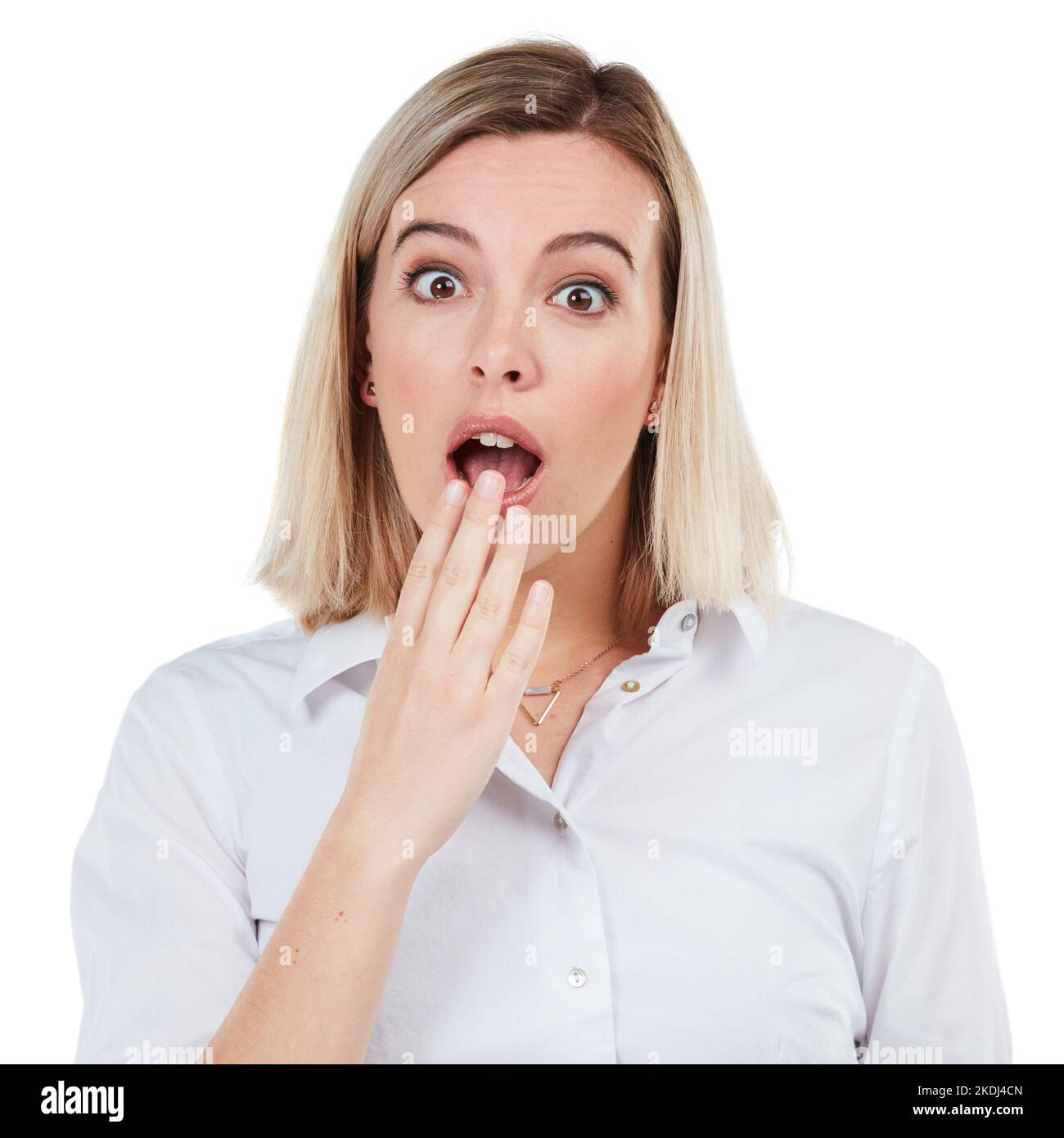 Did you see that. Studio shot of a young businesswoman looking shocked ...