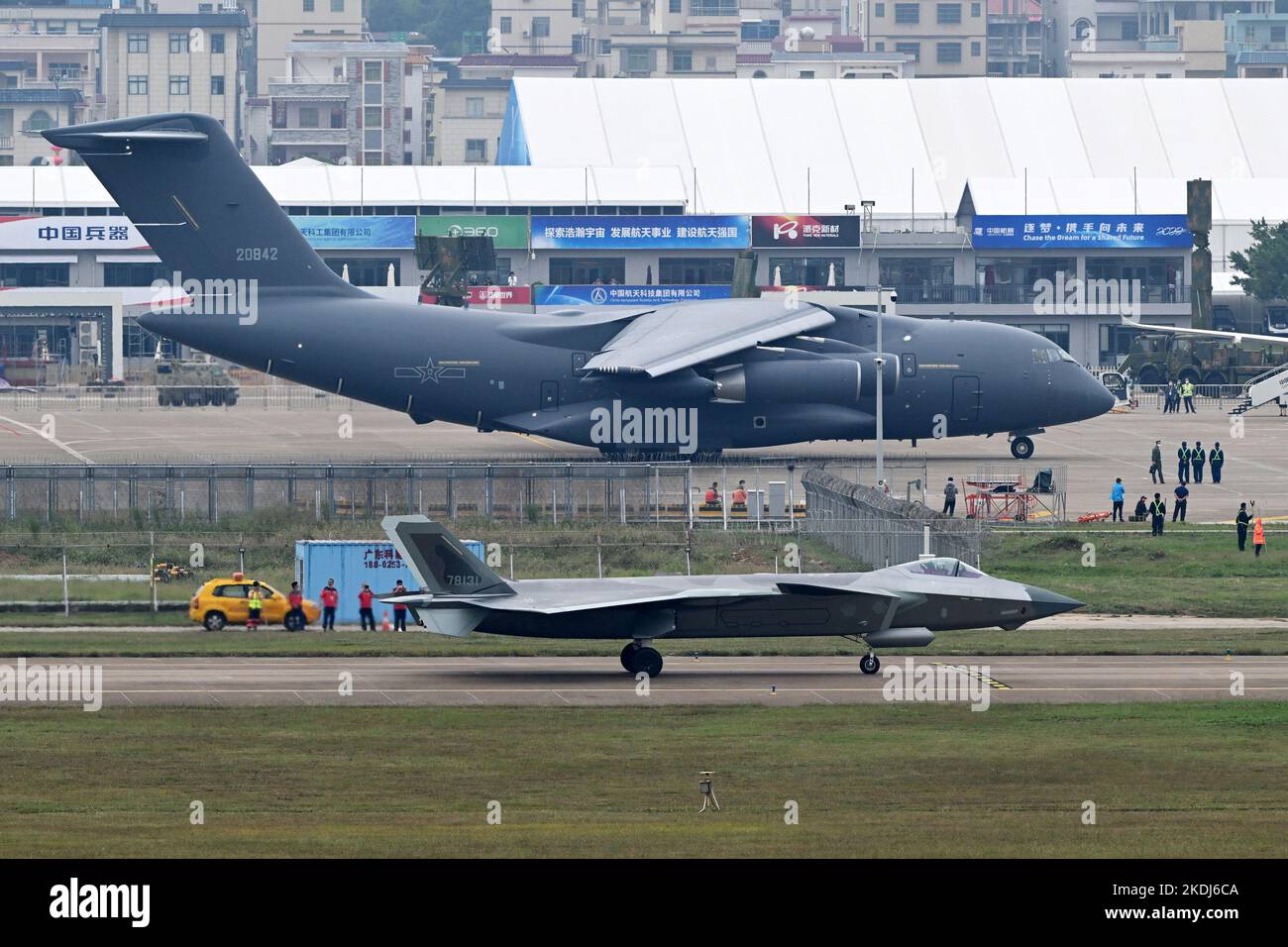 Guangzhou. 5th Nov, 2022. A J-20 stealth fighter jet (front) taxies by ...