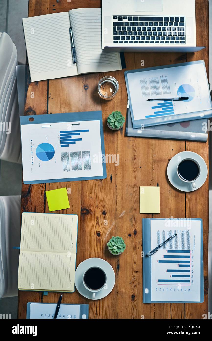 Charting the path towards success. High angle shot of a boardroom table ...