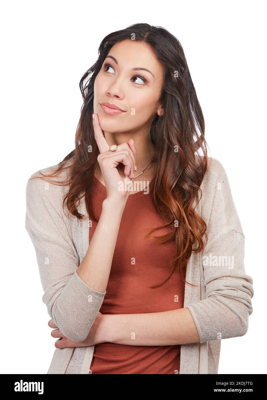 Im just weighing up my options. a happy young woman looking thoughtful ...