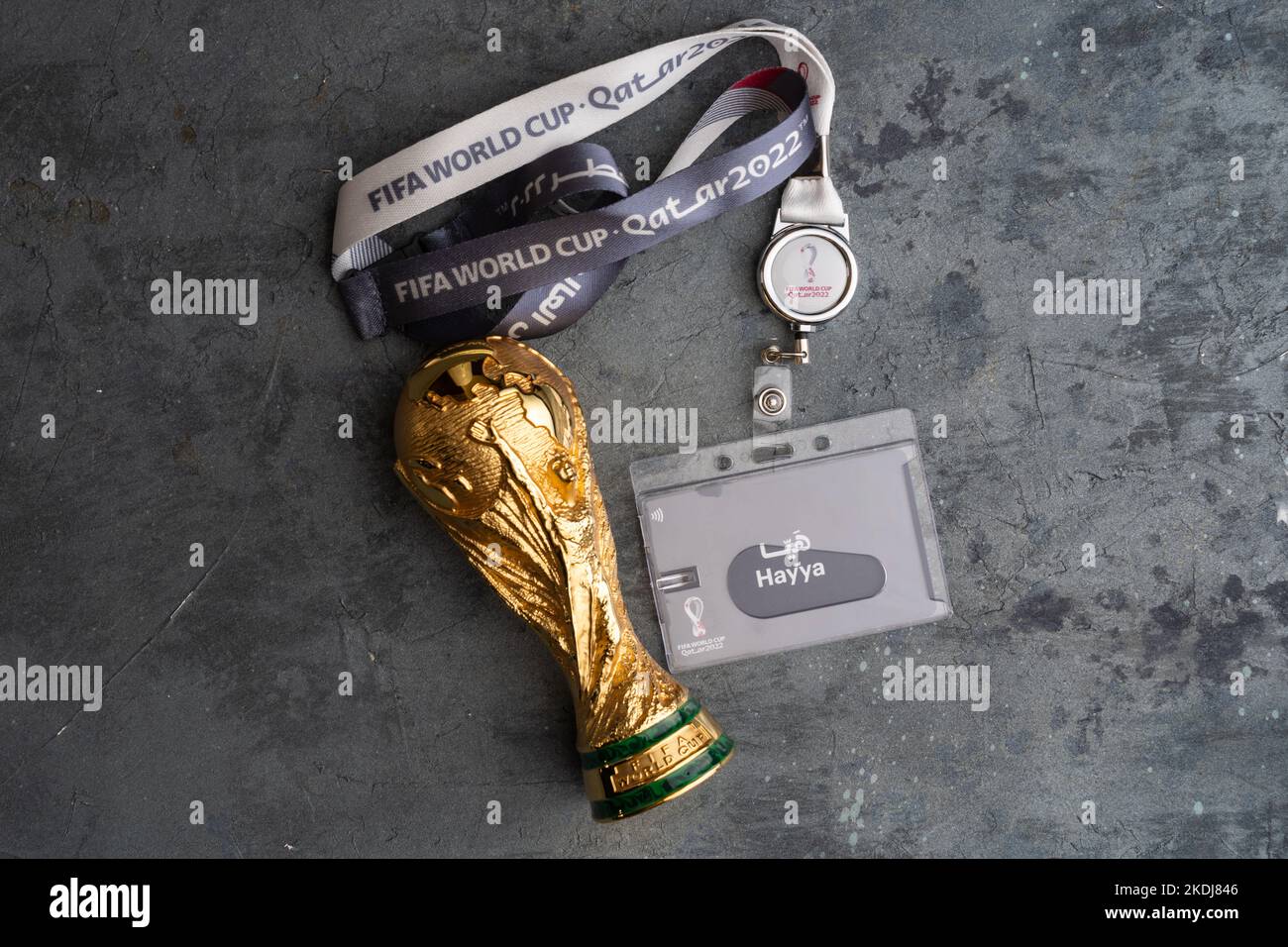 Replica of the World Cup trophy, and Hayya Card with strap. FIFA World ...