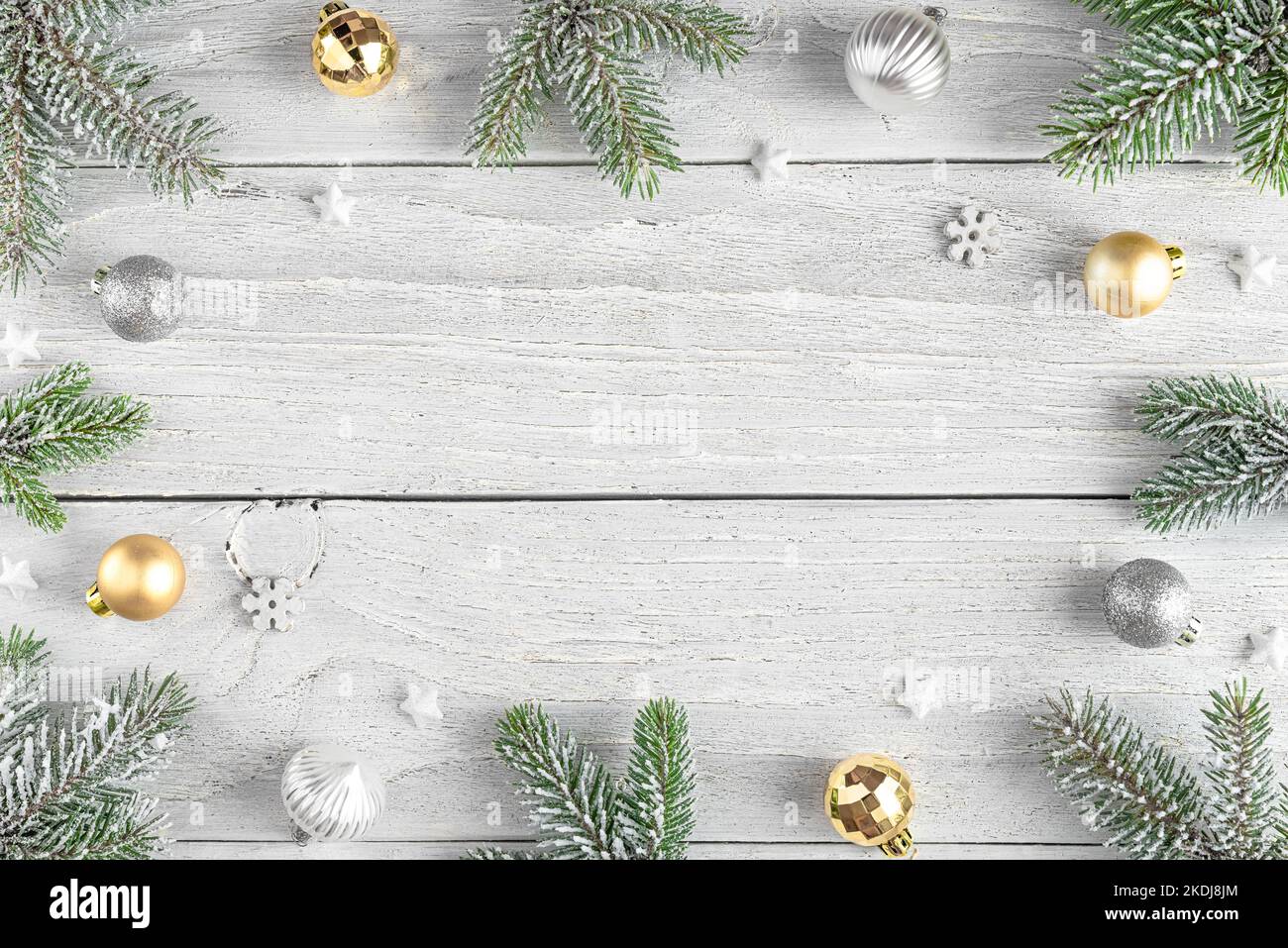 Christmas frame made of fir tree, festive golden and silver decorations ...