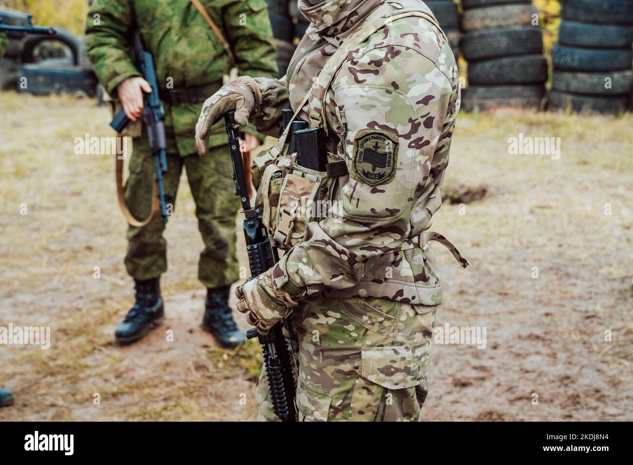 Kazan, Russia. September 29, 2022. Two men with a machine gun. Training ...