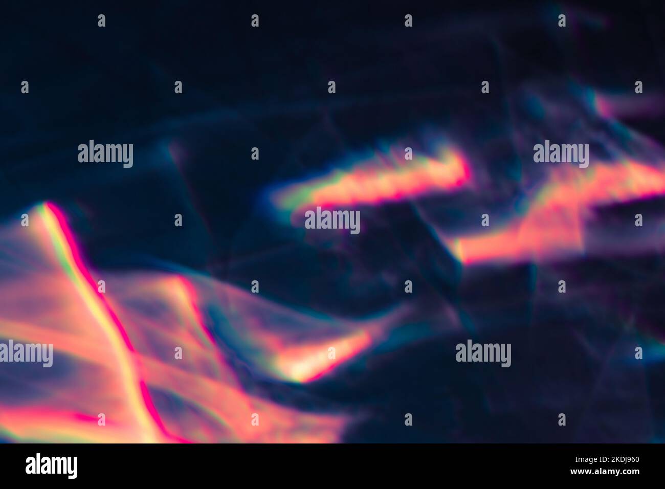 colorful warm pink rainbow light leaks on black background Stock Photo ...