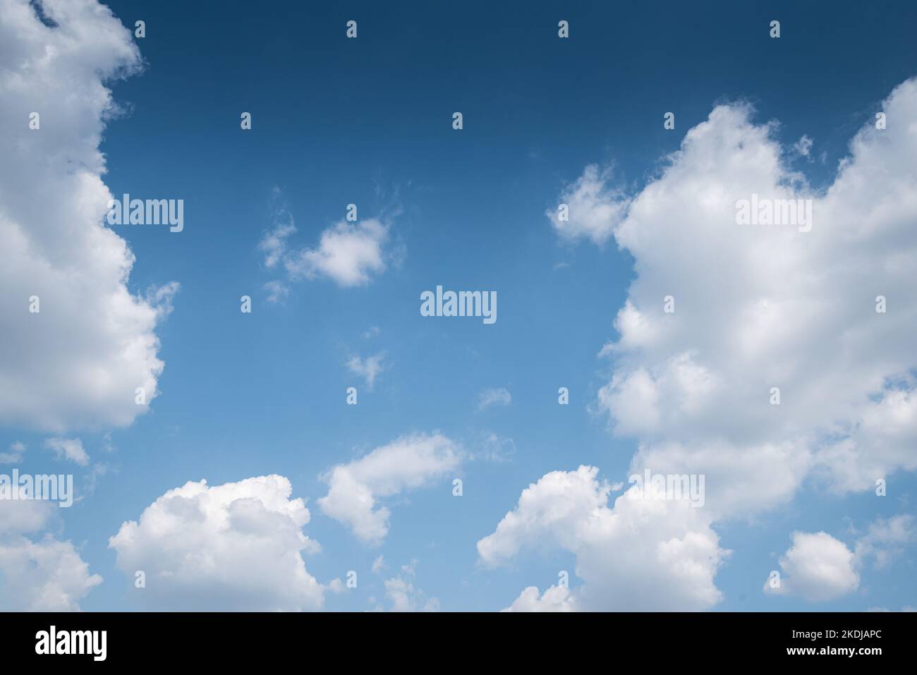 Big blue sky cloudy day background Stock Photo - Alamy