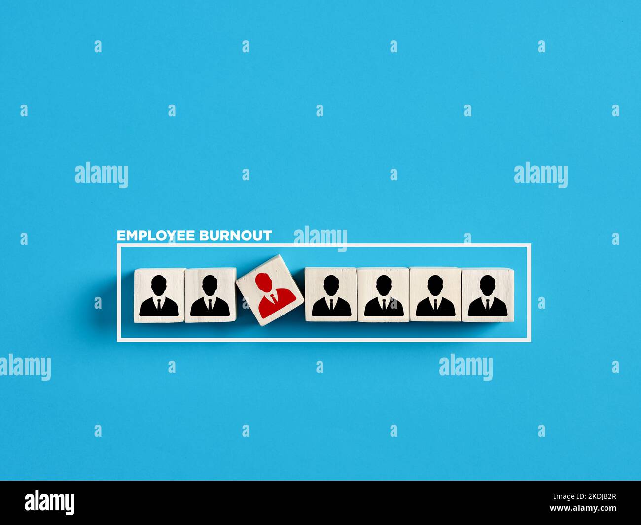 Crooked employee icon in a row of employee line on wooden cubes. Moral ...