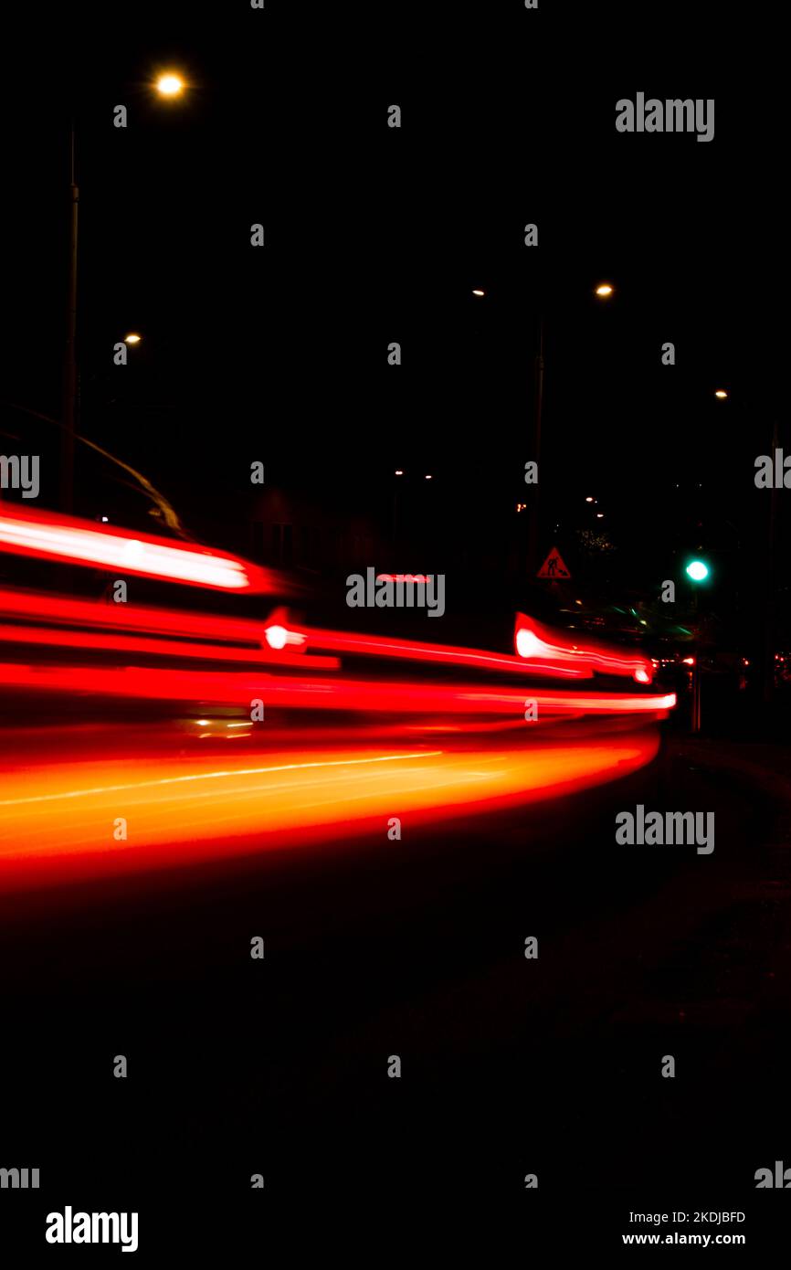 Lights of cars at night. Street line lights. Night highway city. Long ...