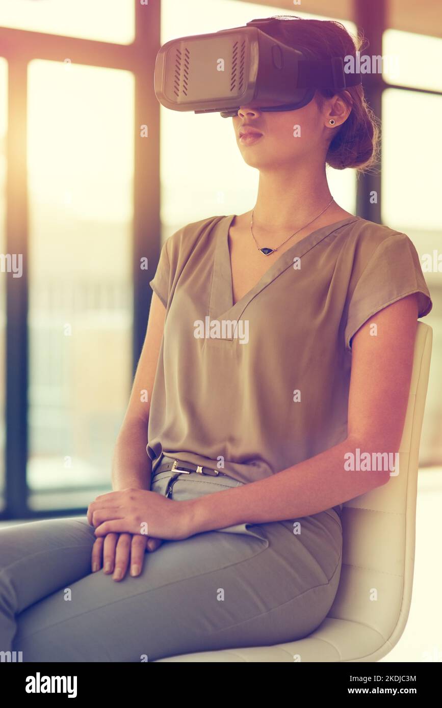 Now you can be present in more places than one. a young businesswoman ...