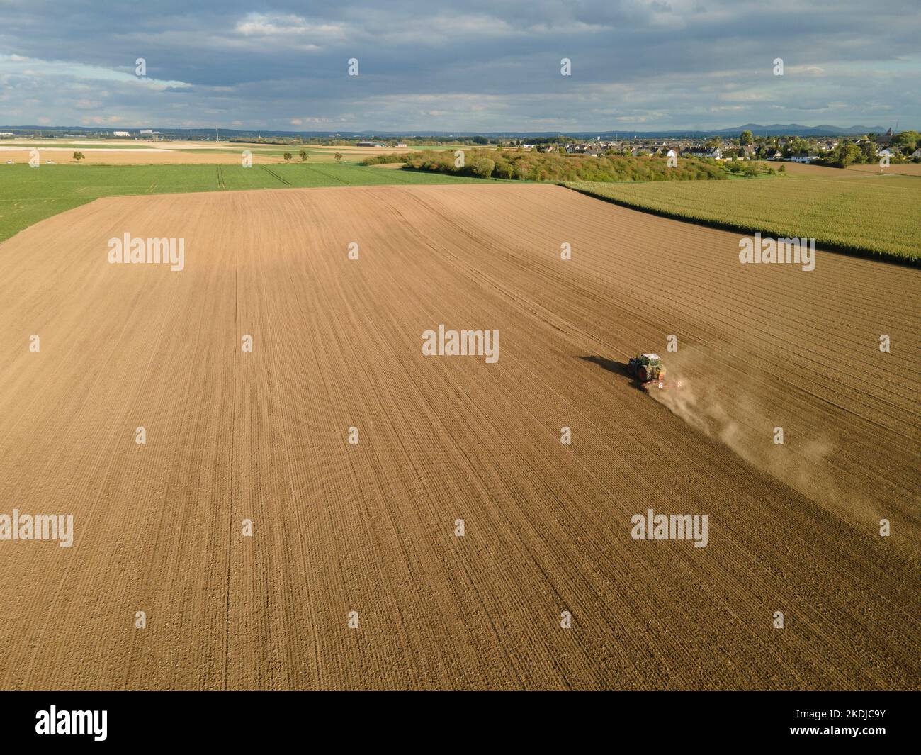 Farmer in tractor soil plows hi-res stock photography and images - Alamy