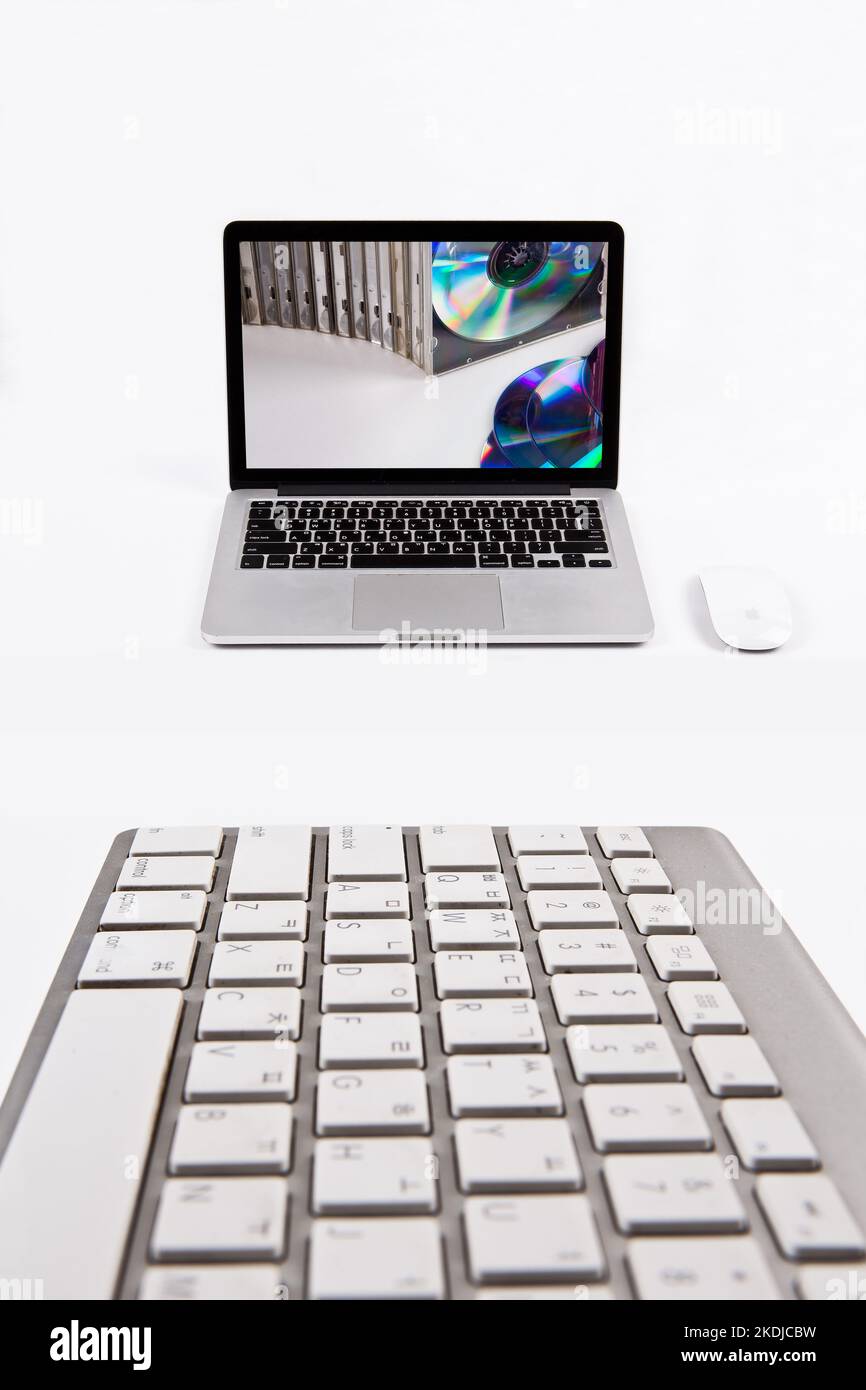 Laptop and keyboard isolated on white background. communication network ...