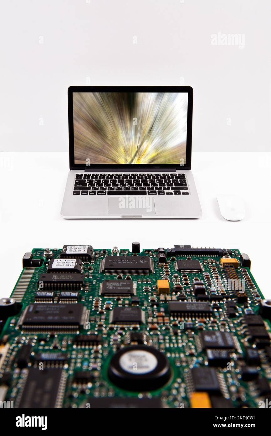 Laptop and circuit board isolated on white background. communication ...