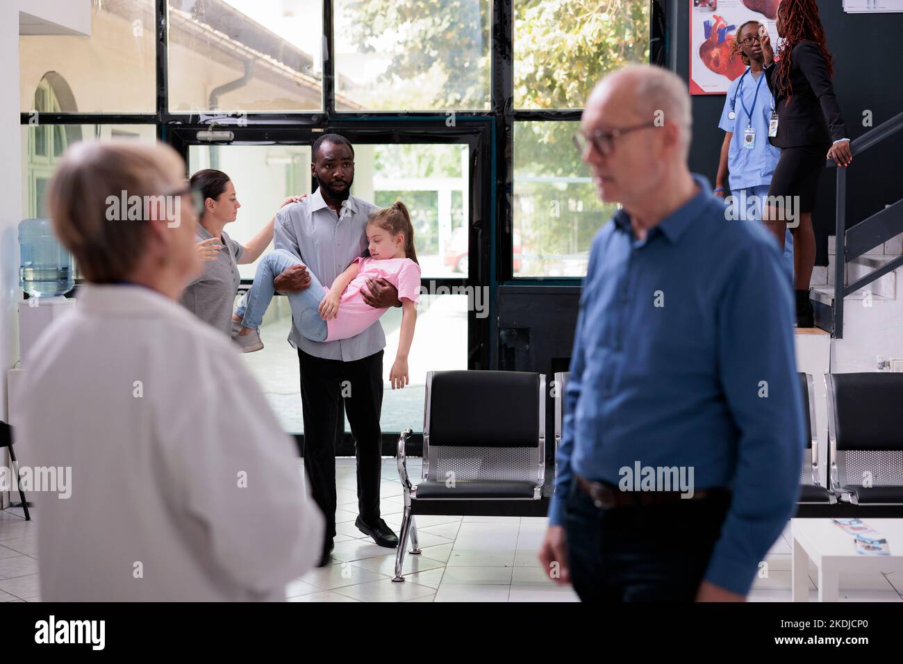 Worried family in hospital waiting room hi-res stock photography and ...