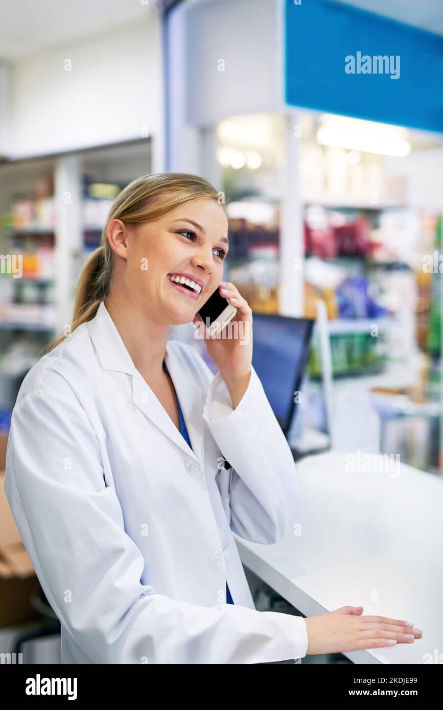 Woman chemist talking pharmacist hi-res stock photography and images ...