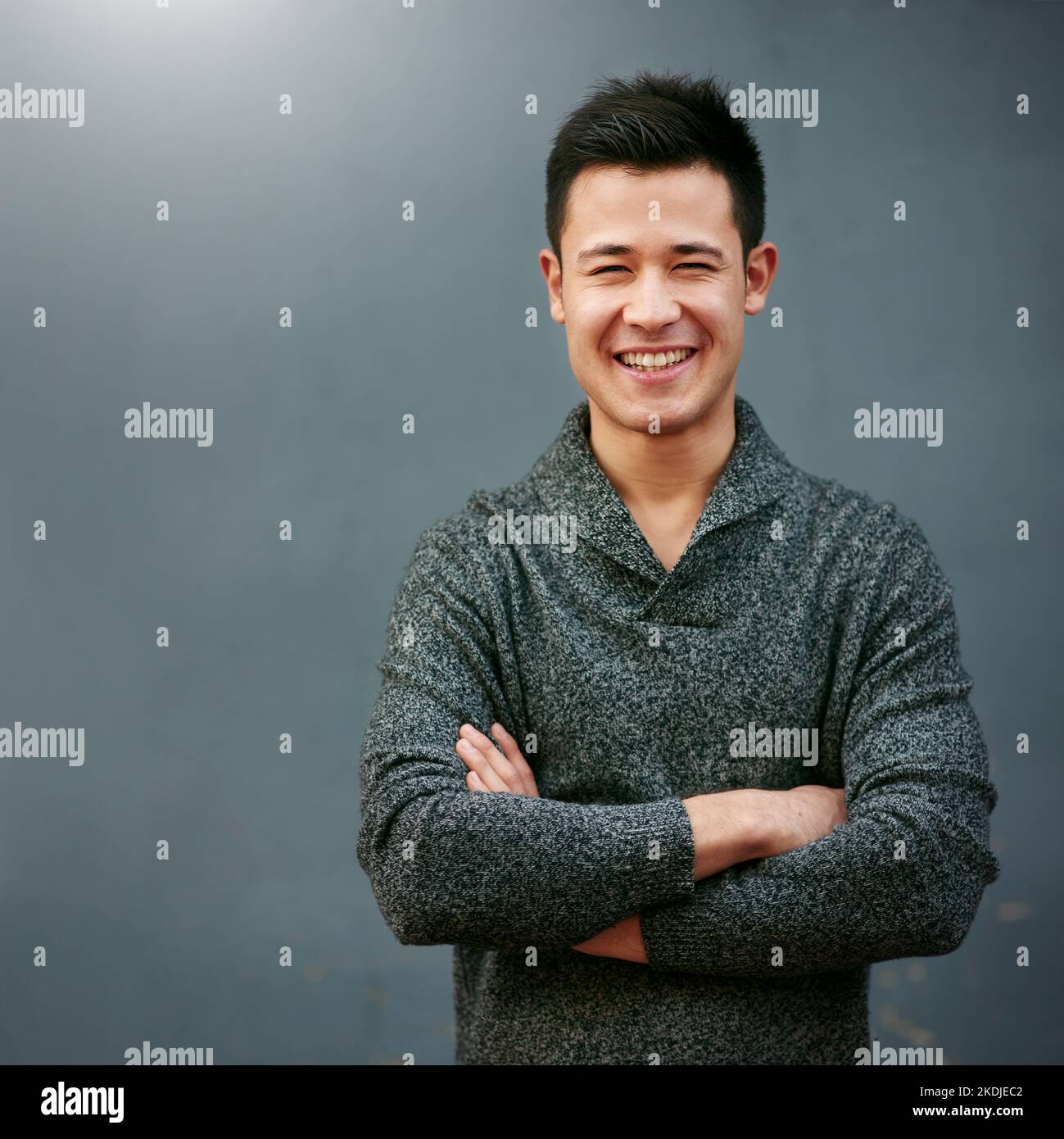 Ive got everything to smile about. Studio portrait of a handsome young ...