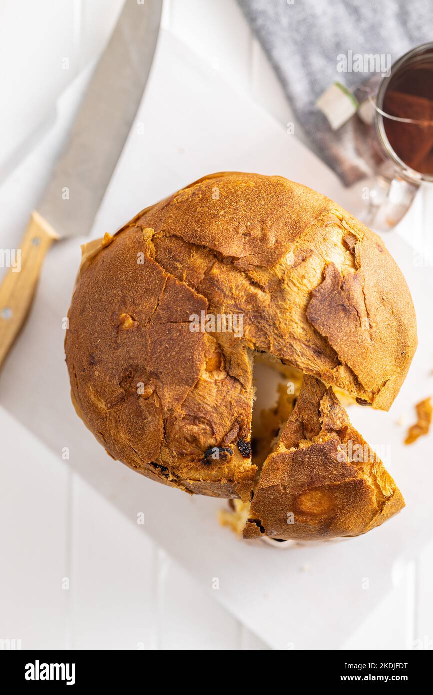 Panettone Christmas Cake. Italian sweet bread on the white kitchen ...