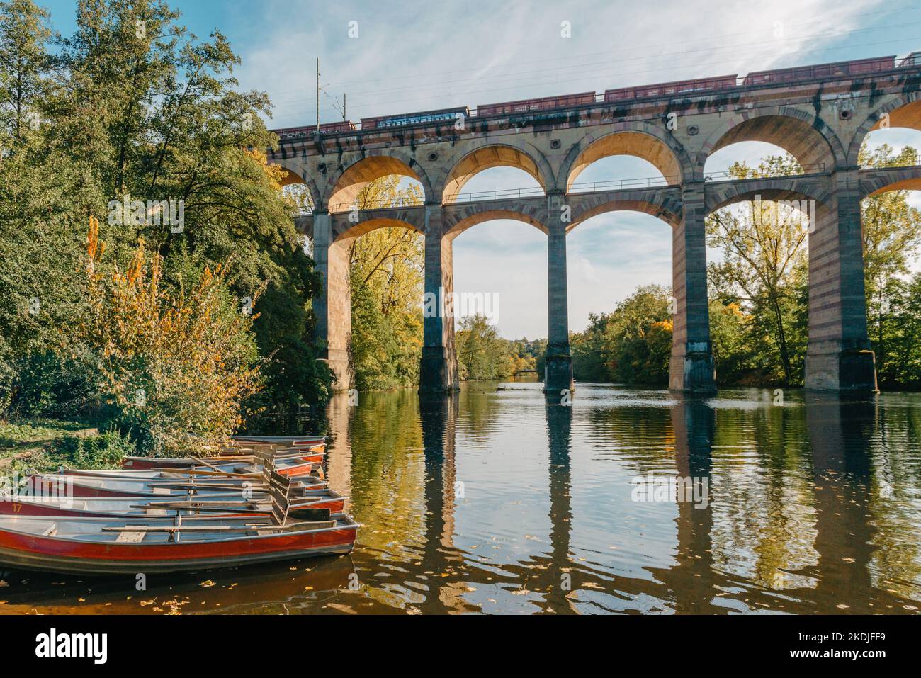 Germany train passing train bridge on cloudy day in germany hi-res ...