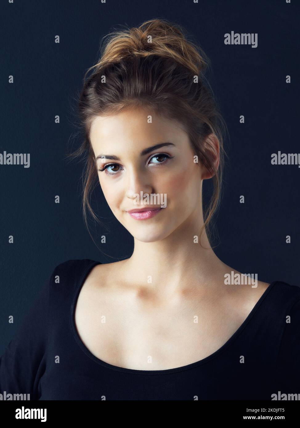 Ready to step out in confidence. a beautiful young woman posing in the studio Stock Photo - Alamy