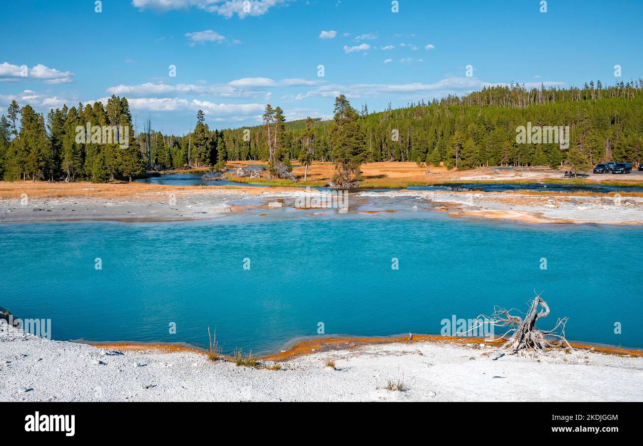 Scenic view of hotspring by geothermal landscape at famous Yellowstone ...