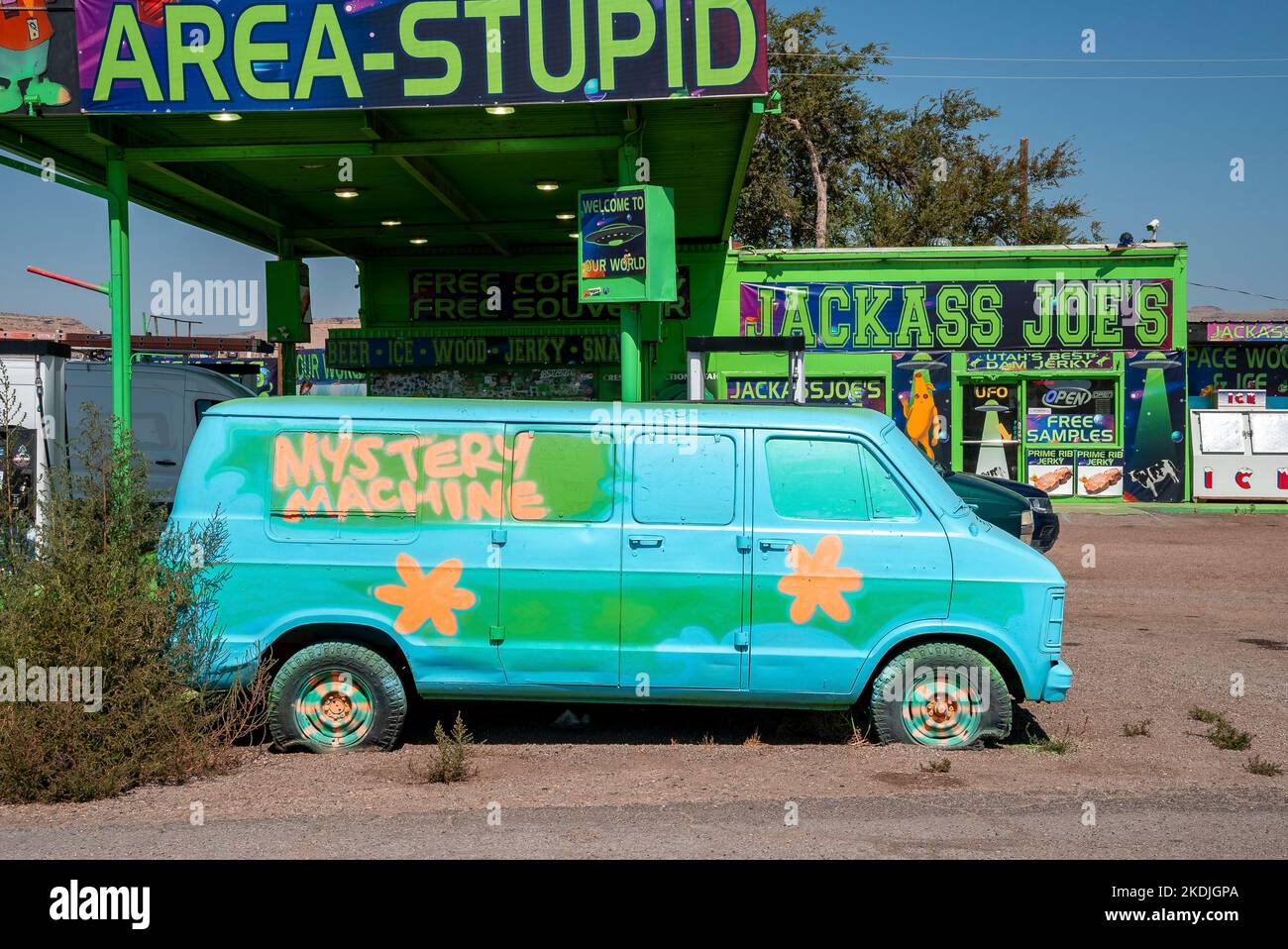 Camper Van Parked At Gas Station Against Jackass Joe Store Stock Photo ...