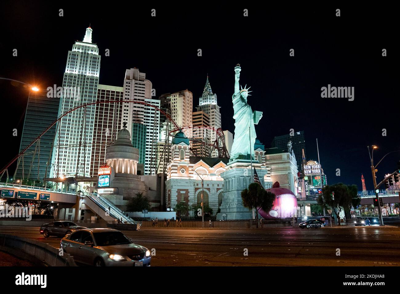 Cars on road by Replica of Statue Of Liberty in New York, New York ...