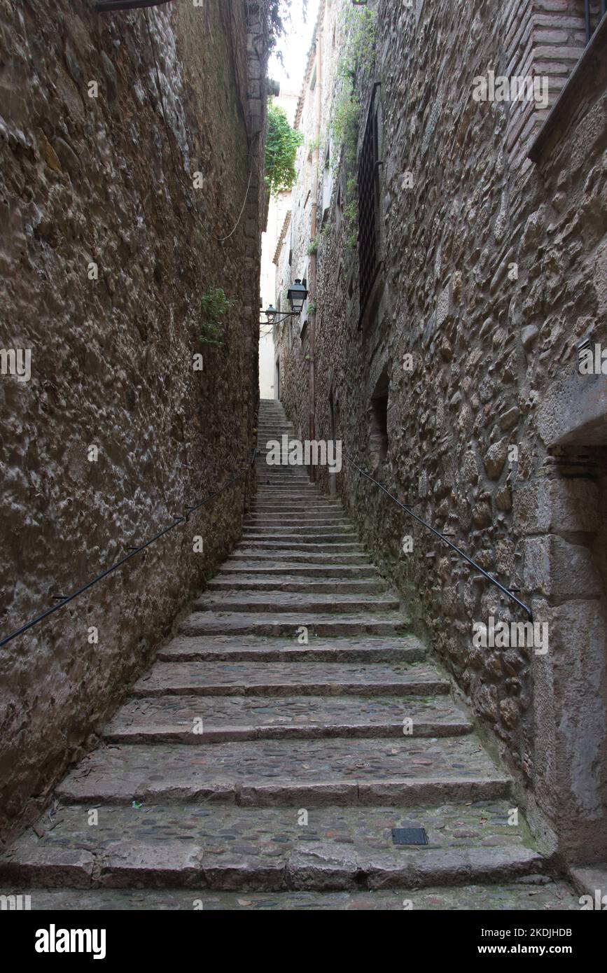 A view of a passageway and steps in Girona's Old Town Stock Photo - Alamy
