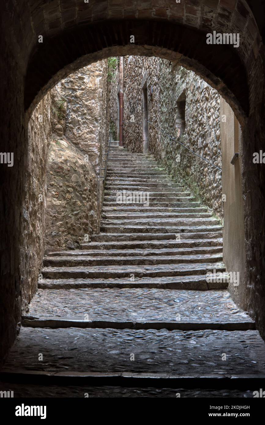 A view of a passageway and steps in Girona's Old Town Stock Photo - Alamy