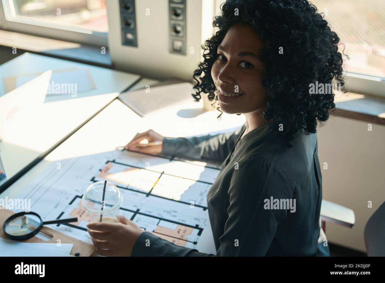 Female sitting sideways camera hi-res stock photography and images - Alamy