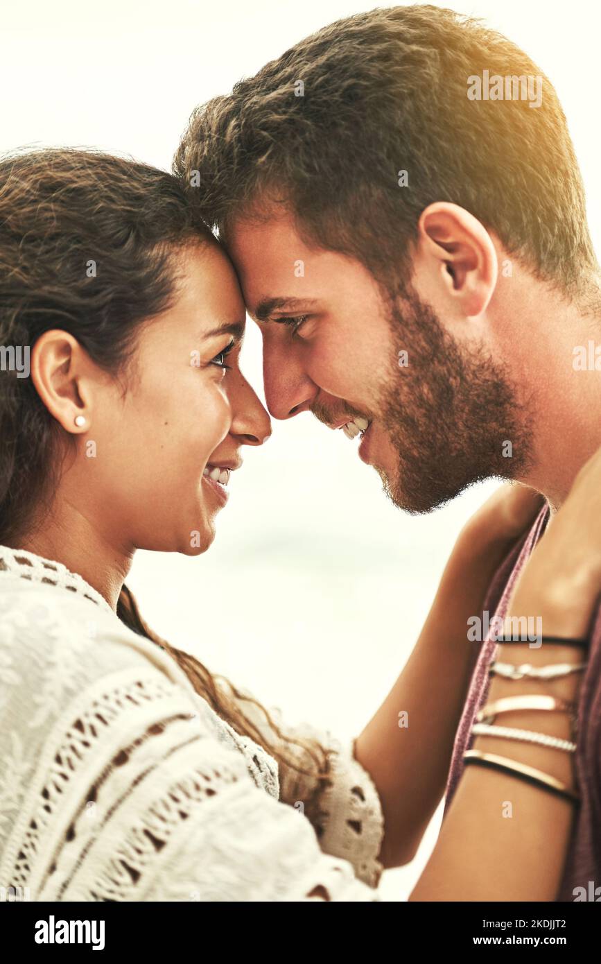 Looking deep into her eyes. an affectionate young couple enjoying their ...