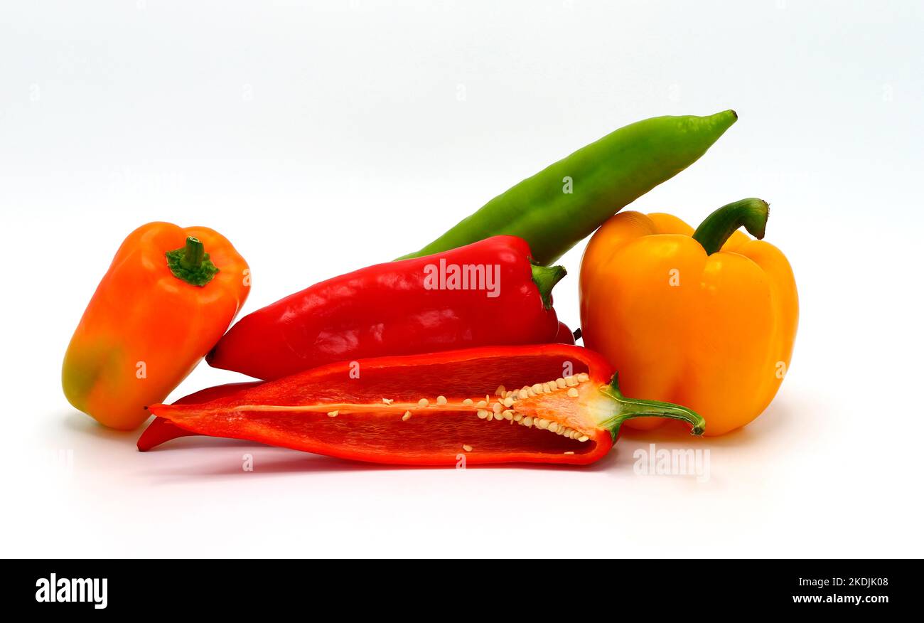 Composition of several sweet peppers and their halves of different ...