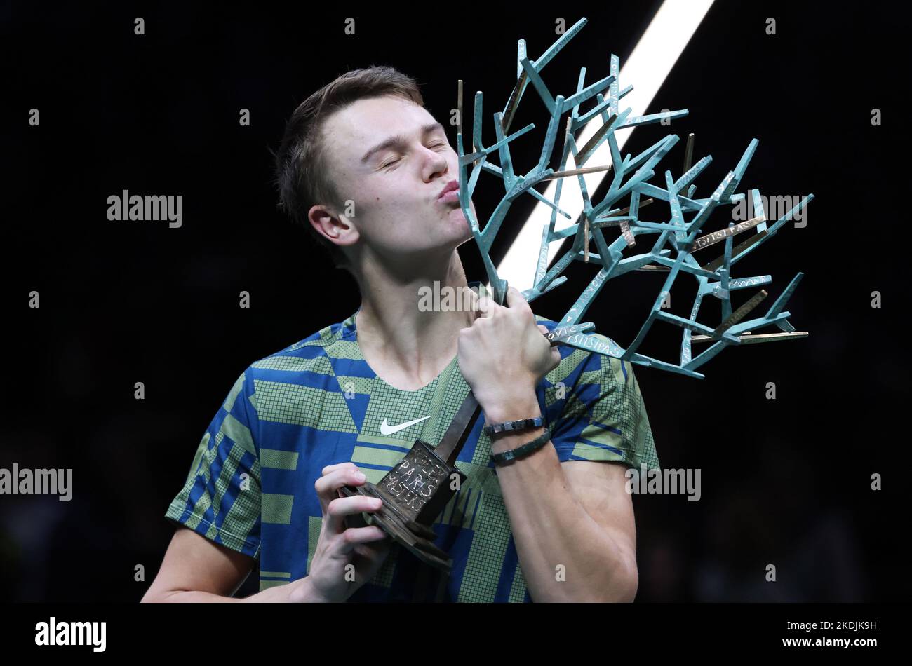 Paris, France. 6th Nov, 2022. Holger Rune of Denmark displays his trophy during the awarding ...