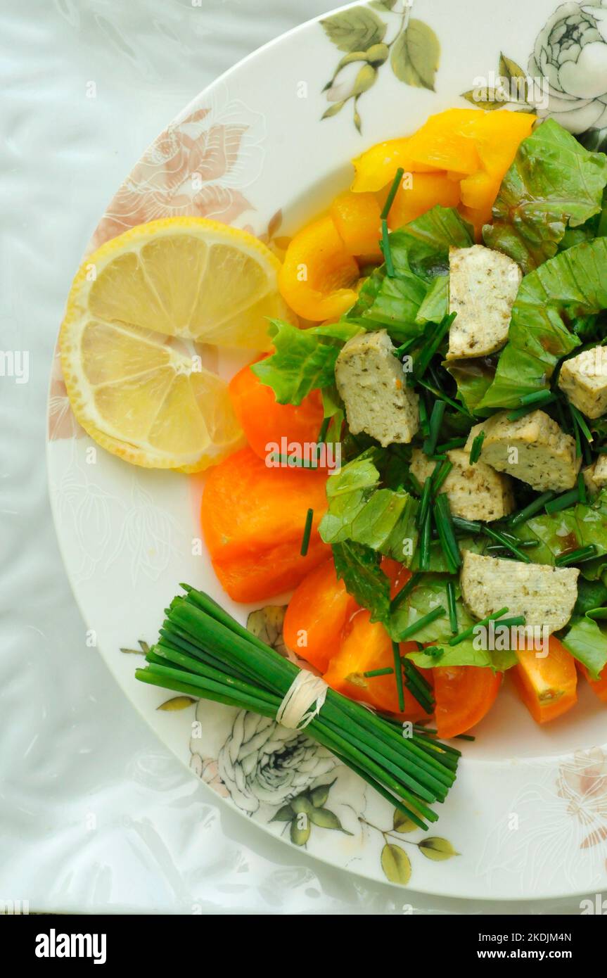 Civet - Chives - Food - salad plate, orange tomatoes, tofu with herbs ...