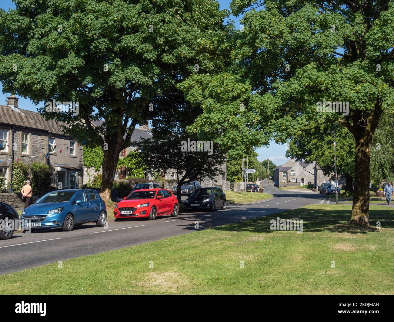 Street scene in Summer in the pretty Peak District village of Litton ...
