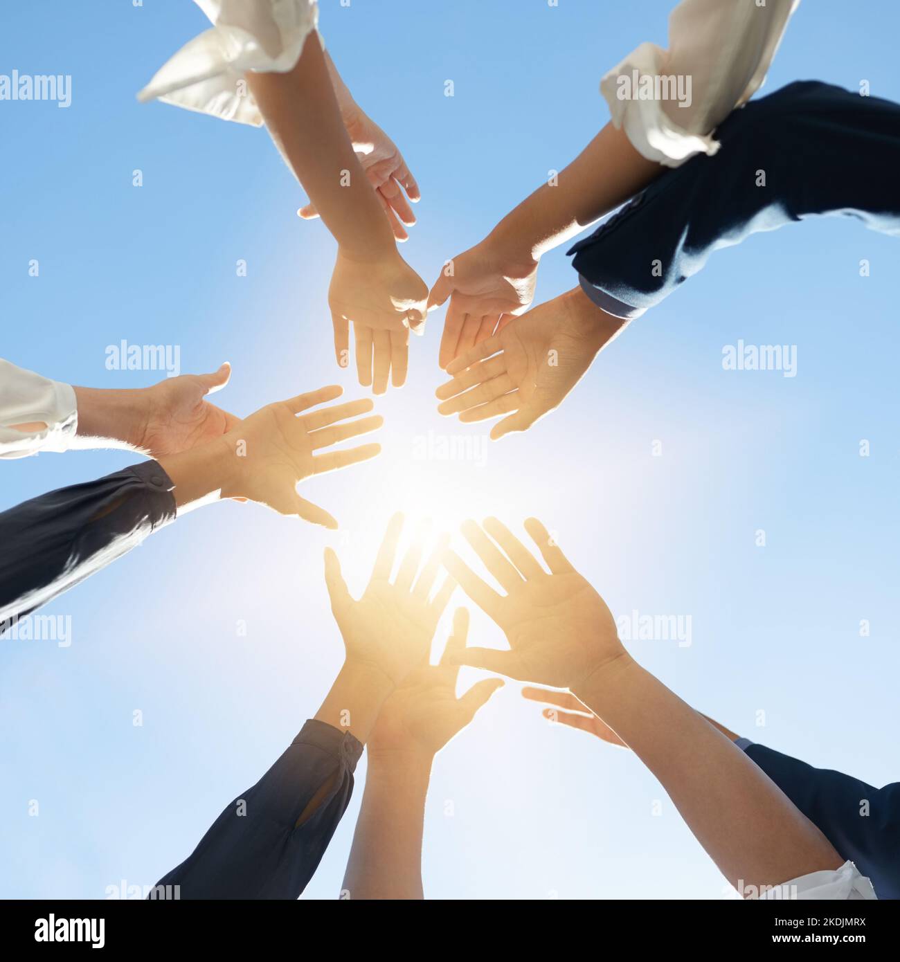 Reaching for unity hi-res stock photography and images - Alamy