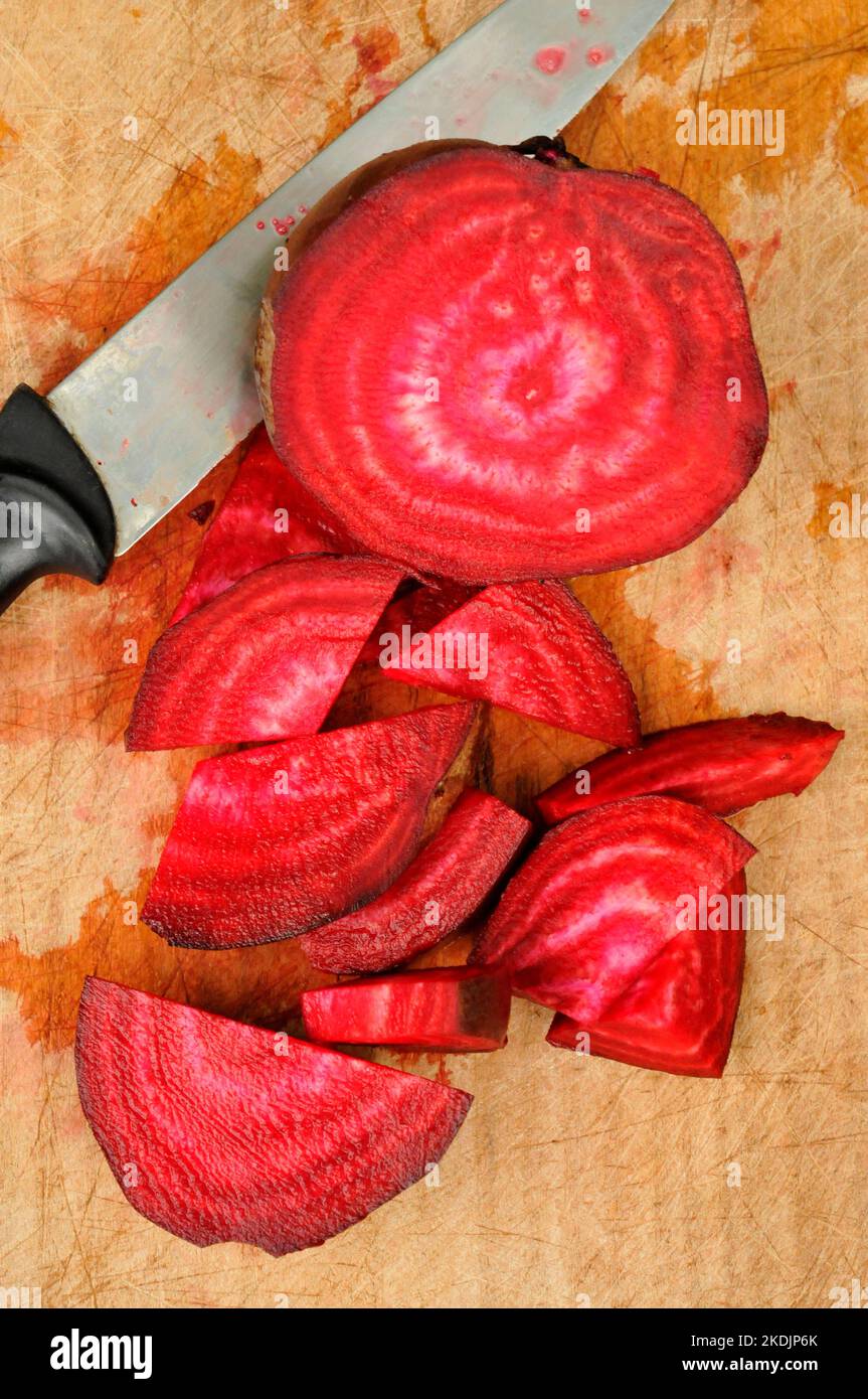 Beetroot (Beta vulgaris) cut on a kitchen board Stock Photo - Alamy